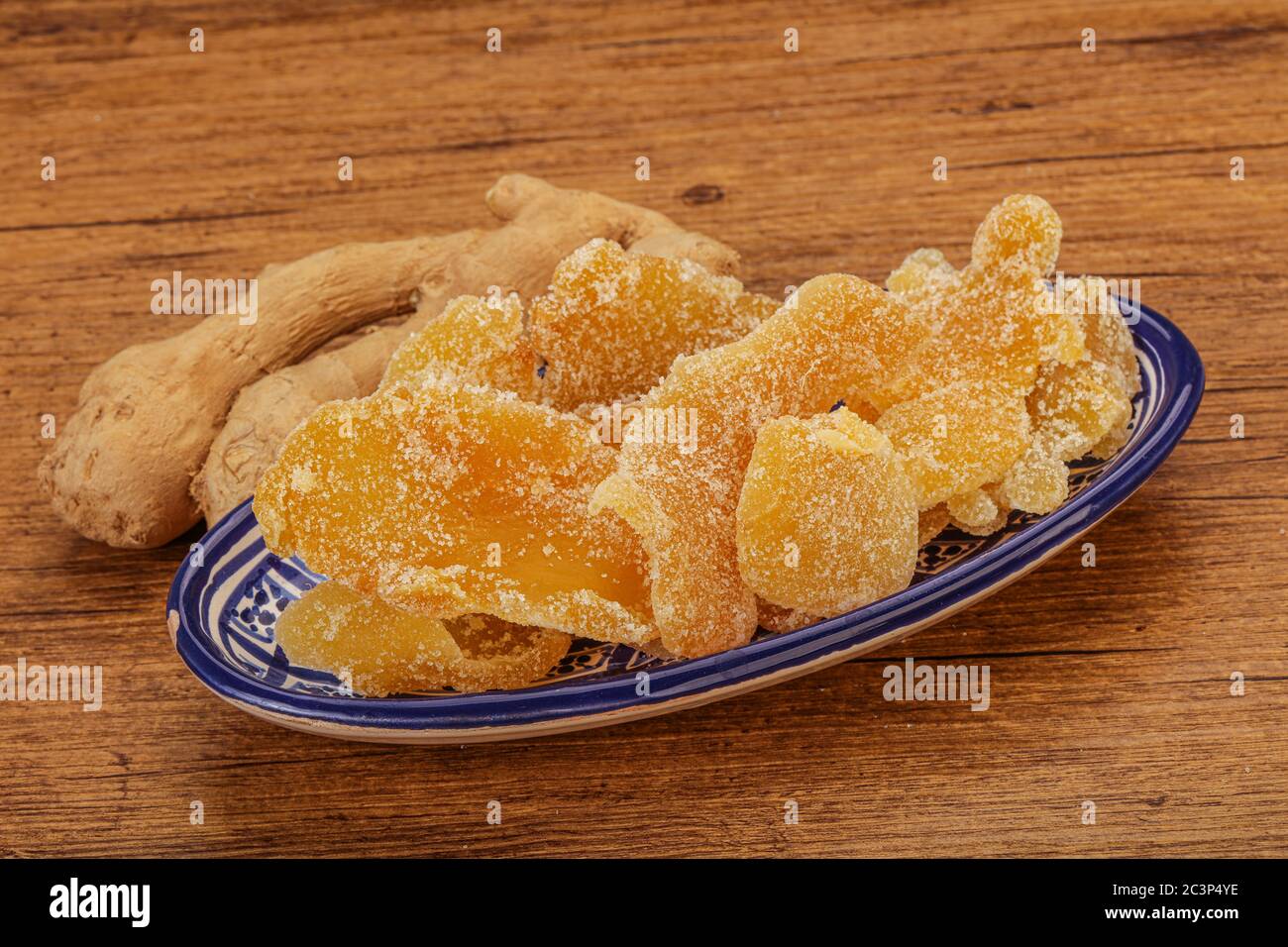Dry sweet ginger snack in the bowl Stock Photo - Alamy