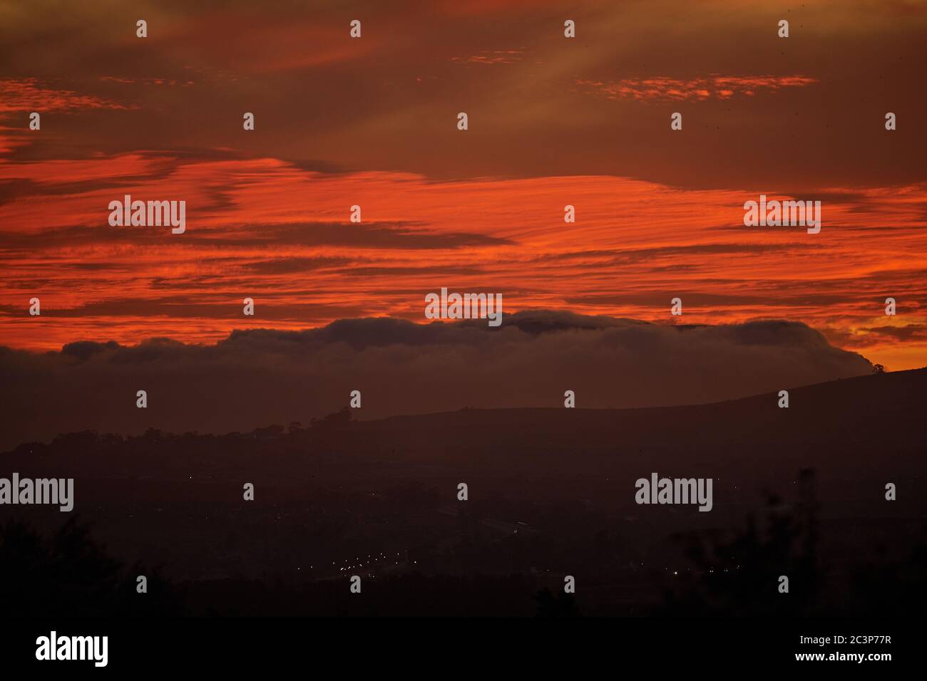 Fiery Red Sunset over Table Mountain Stock Photo - Alamy
