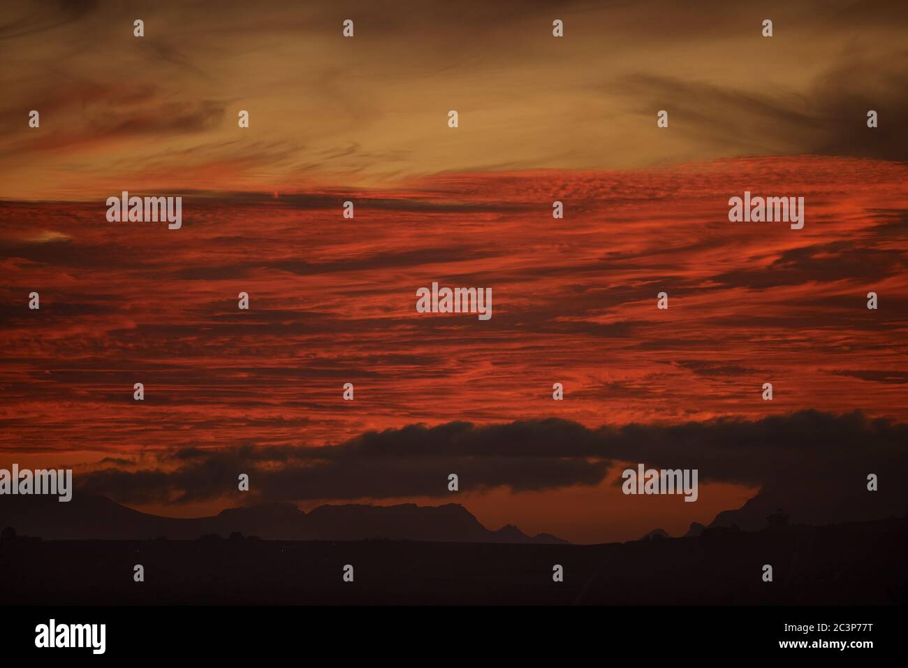 Fiery Red Sunset over Table Mountain Stock Photo - Alamy