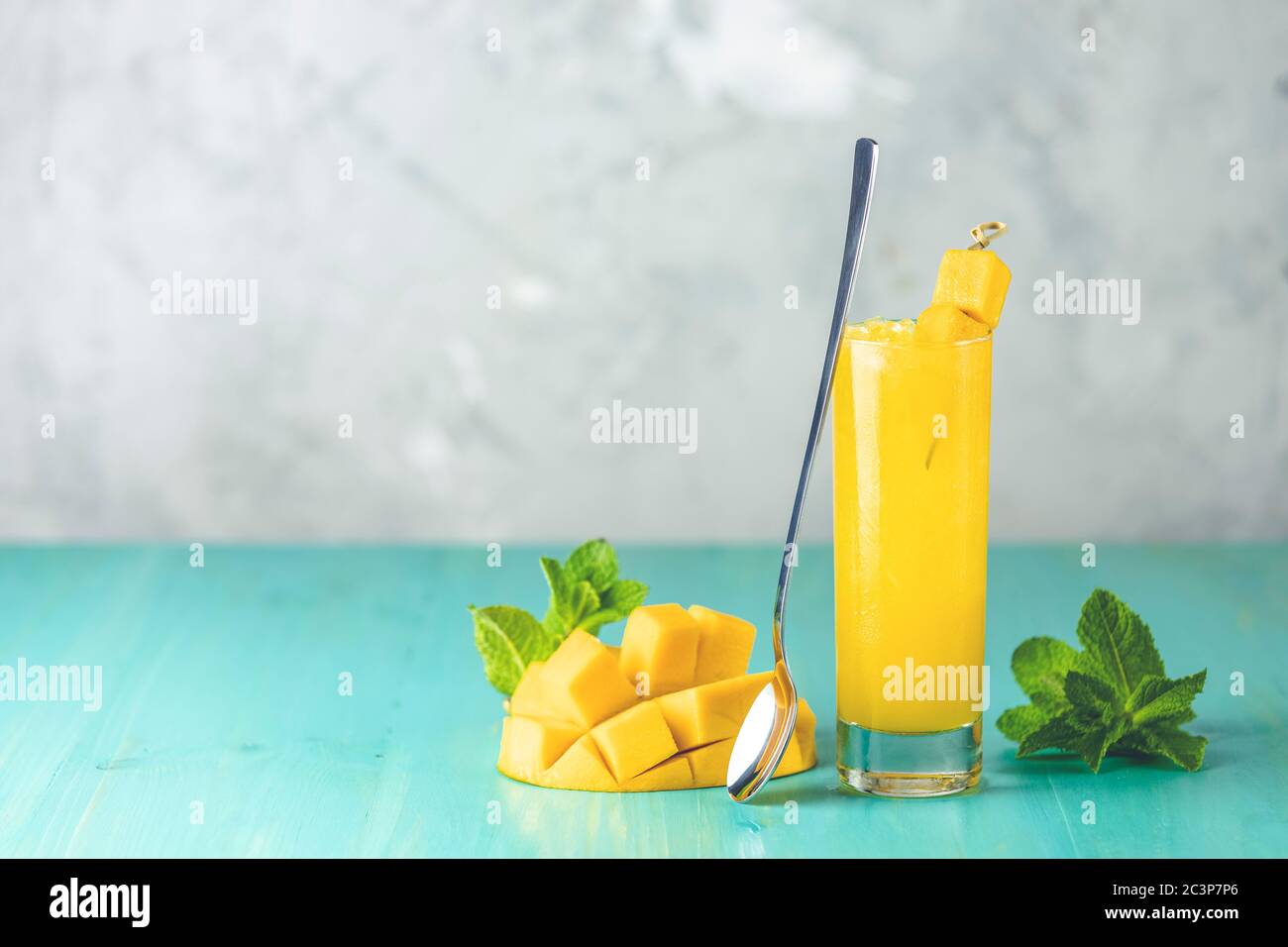 Refreshing summer cocktails made of mango, cold drink or a drink with ...