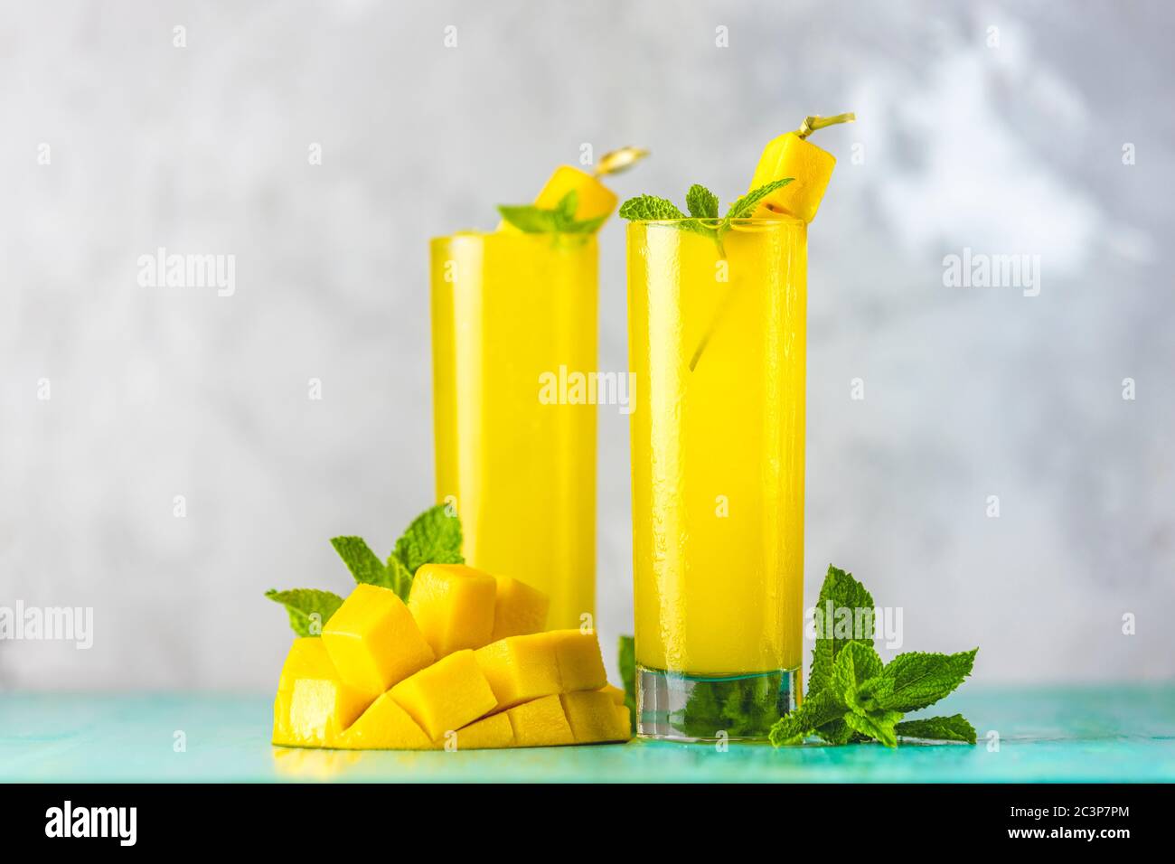 Refreshing summer cocktails made of mango, cold drink or a drink with ...