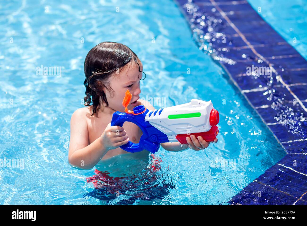Young kid playing pool hi-res stock photography and images - Alamy