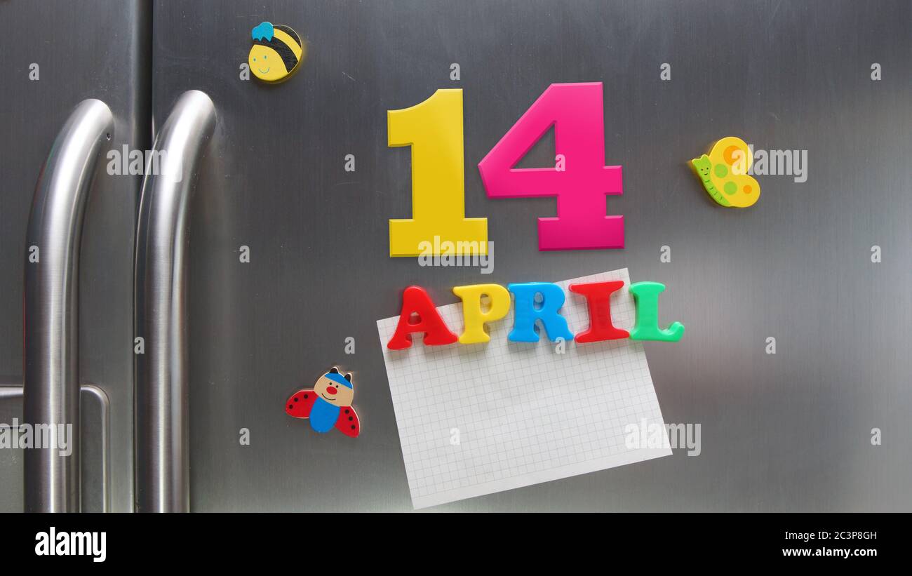 April 14 calendar date made with plastic magnetic letters holding a ...