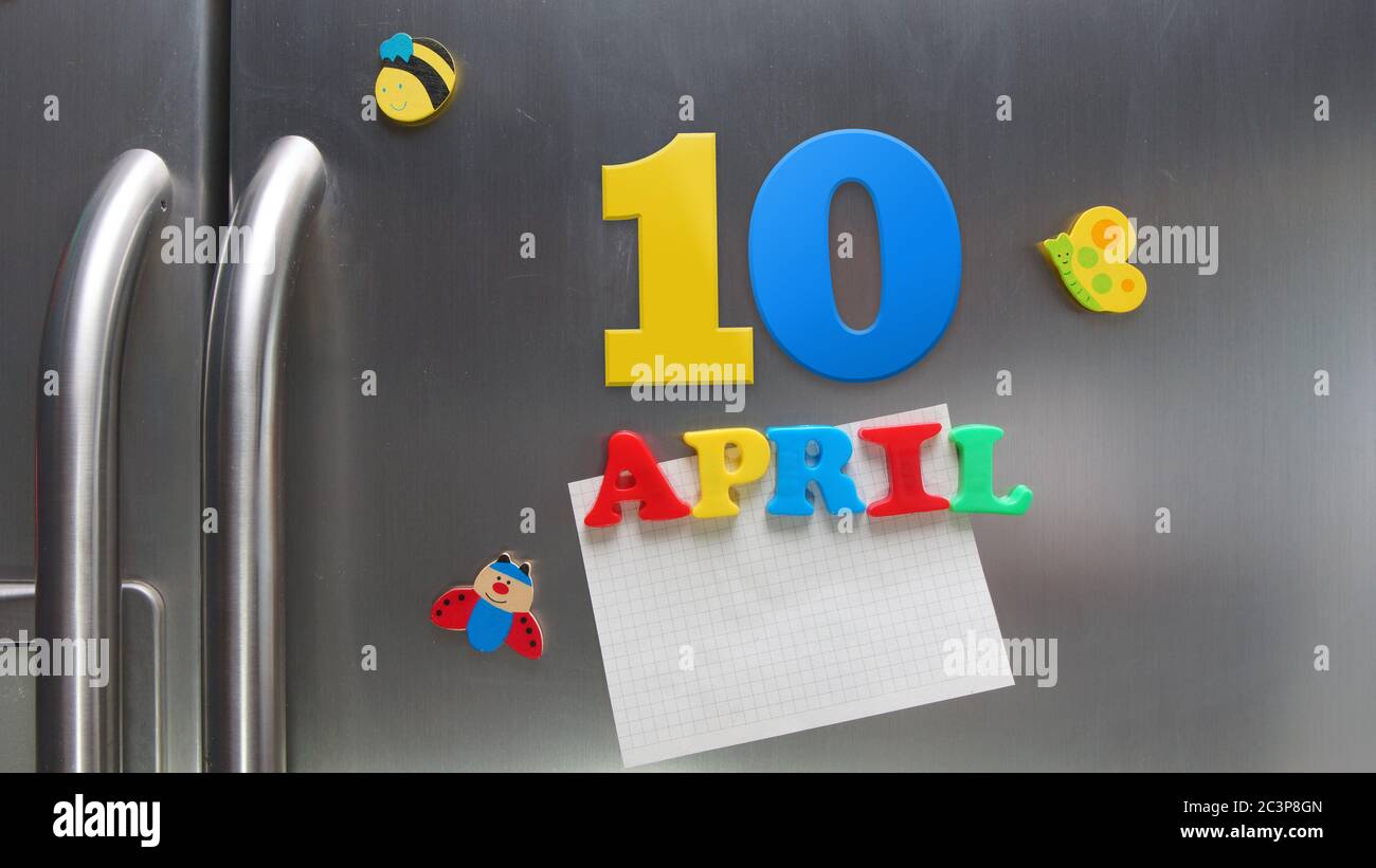 April 10 calendar date made with plastic magnetic letters holding a ...