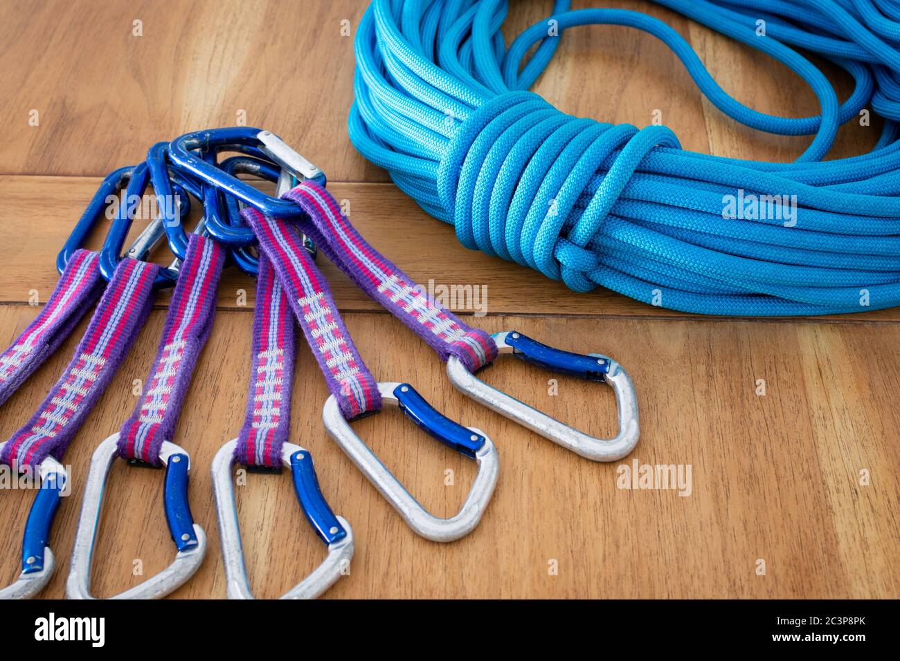 Closeup shot of rock climbing equipment under the light: ropes ...