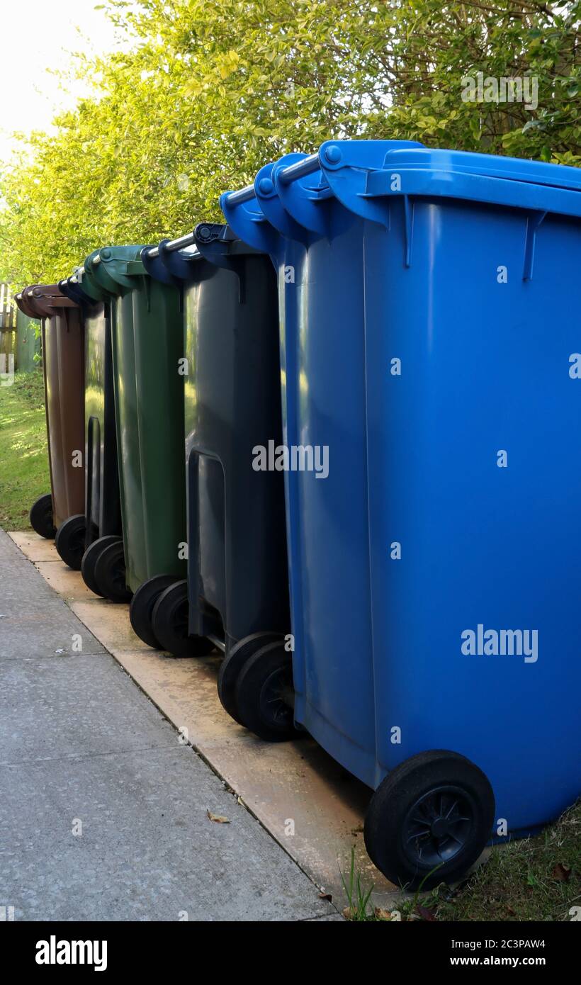 Waste disposal recycling bins in a house driveway Stock Photo - Alamy