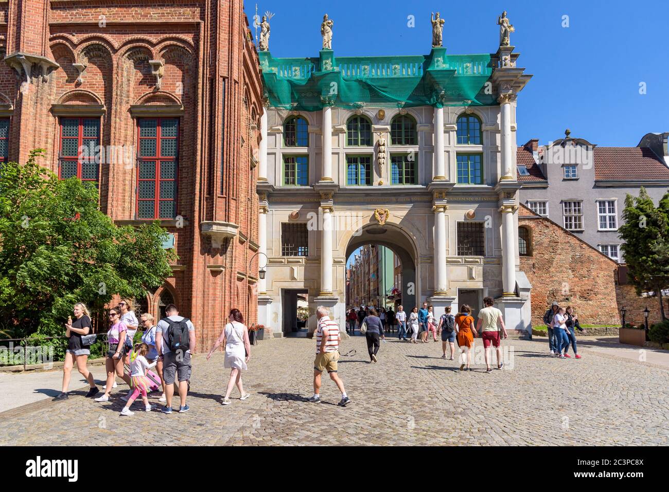 Gdansk, Poland - June 14, 2020: People enter the old city of Gdansk ...