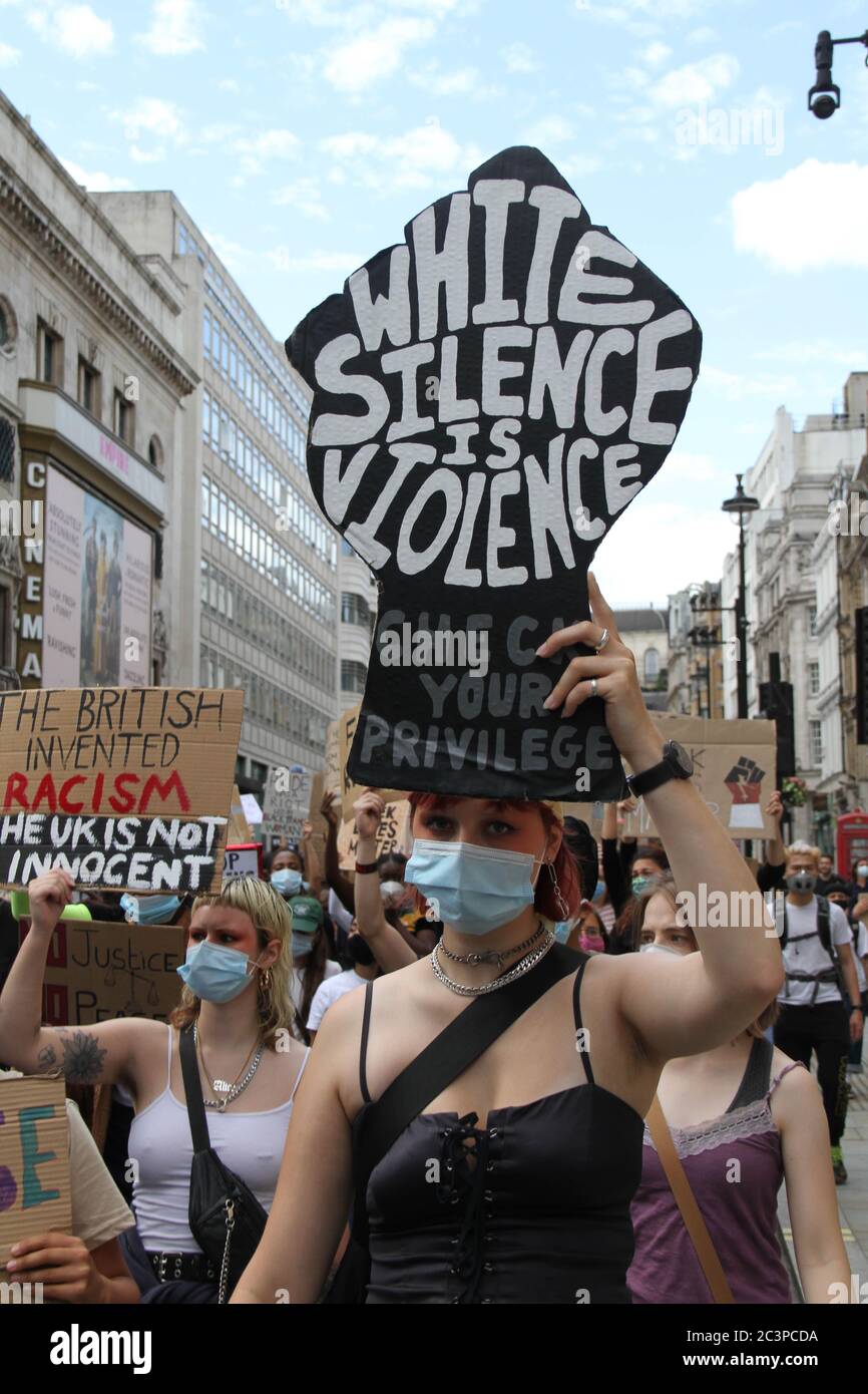 White silence is violence placard hi-res stock photography and images ...