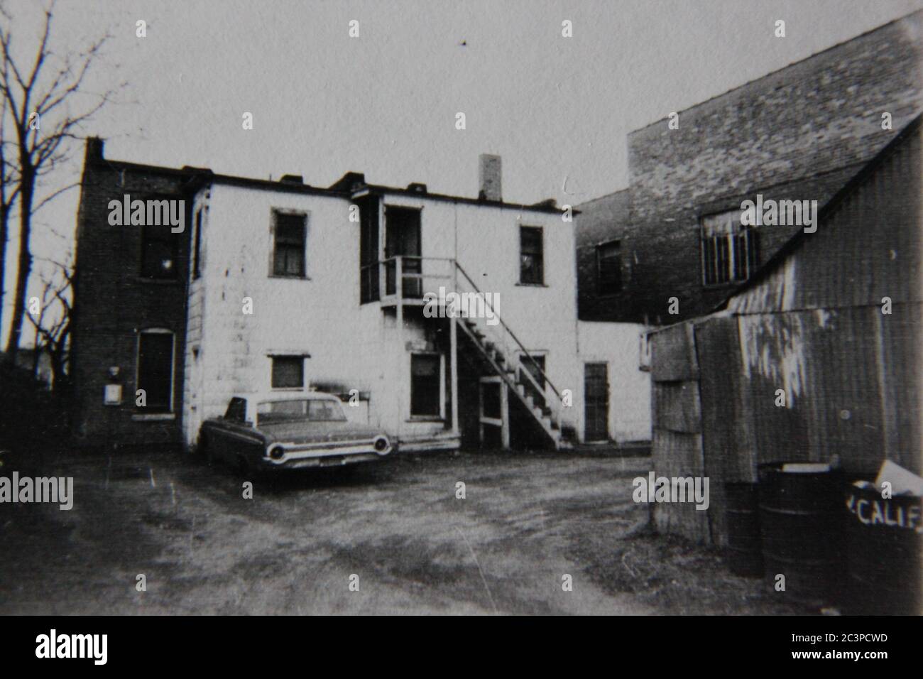 Fine 70s vintage black and white photography of the backyard of a two ...