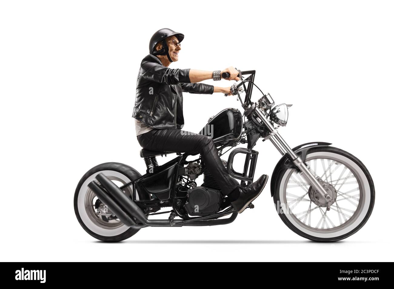 Cool elderly biker riding a customized chopper motorbike isolated on ...