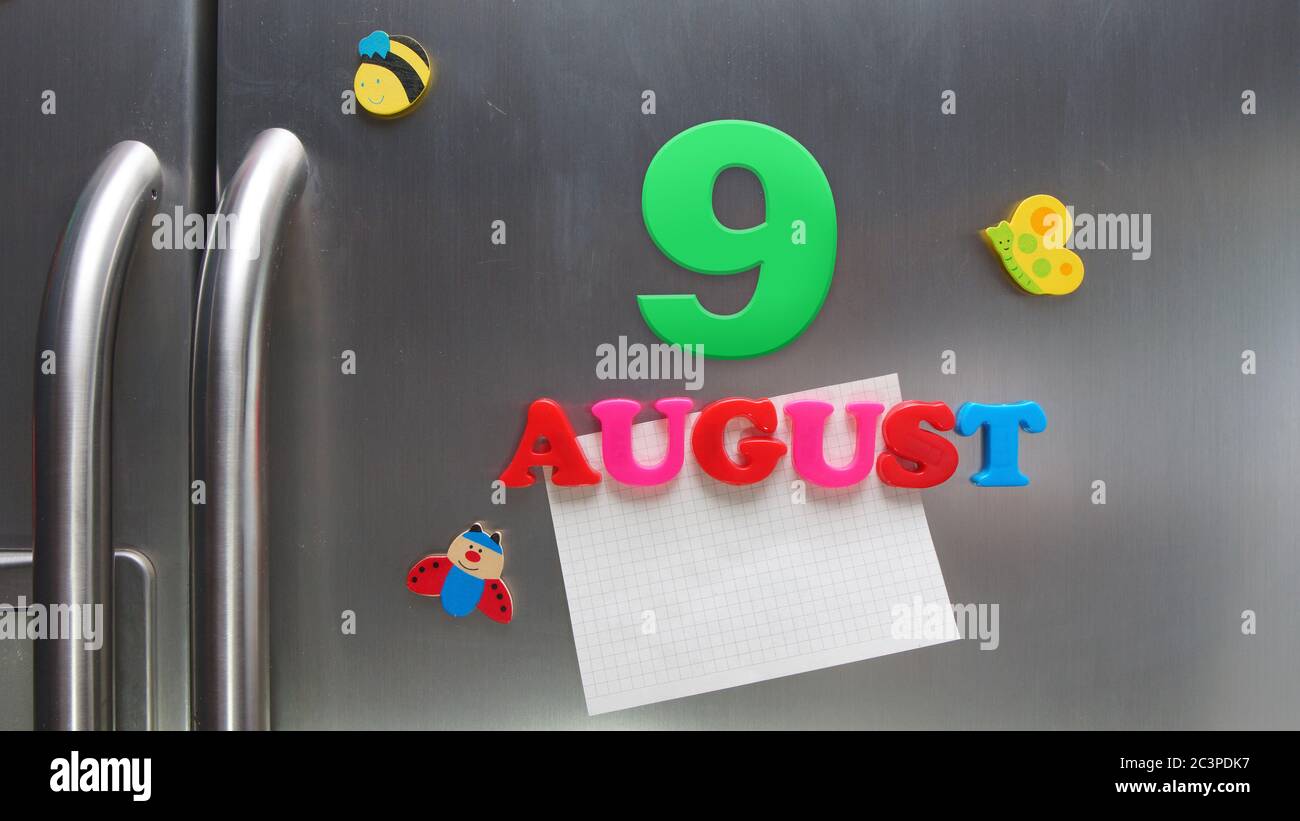August 9 calendar date made with plastic magnetic letters holding a ...