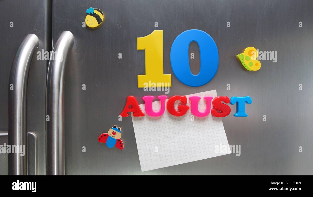August 10 calendar date made with plastic magnetic letters holding a ...