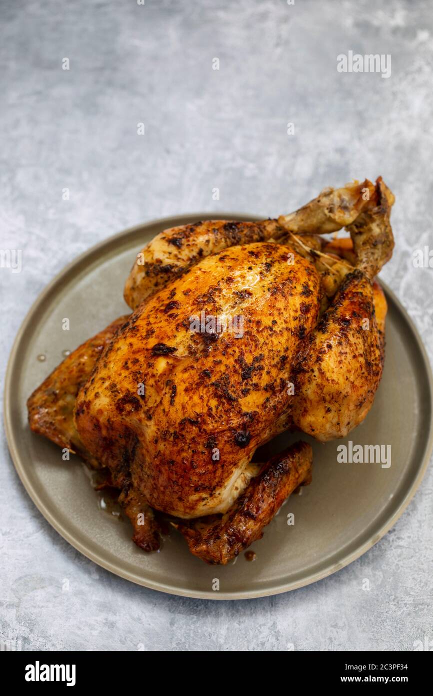 Whole roast chicken freshly from the oven Stock Photo - Alamy