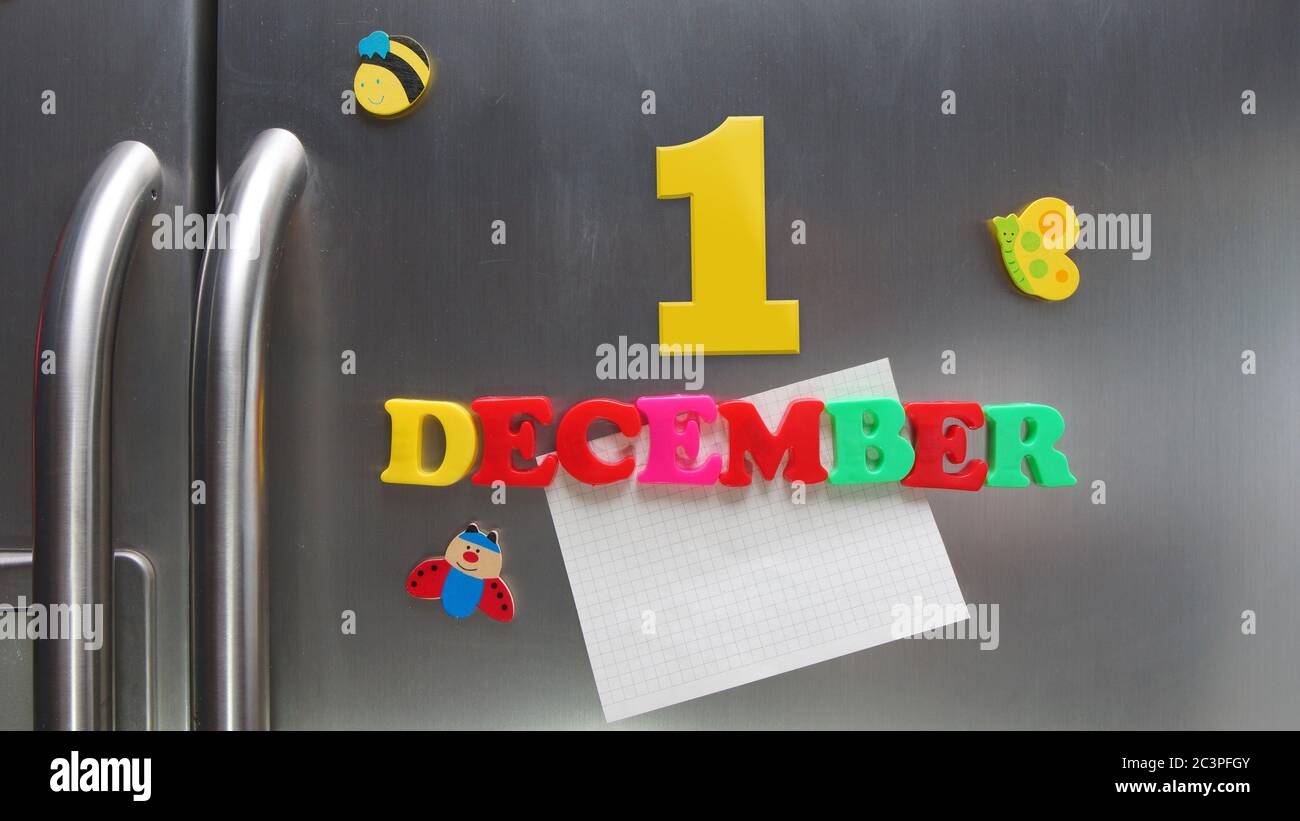 December 1 calendar date made with plastic magnetic letters holding a ...