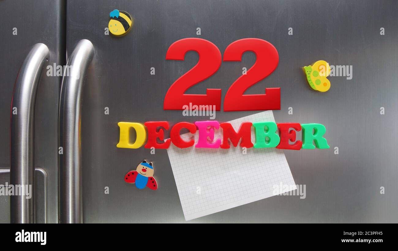 December 22 calendar date made with plastic magnetic letters holding a ...
