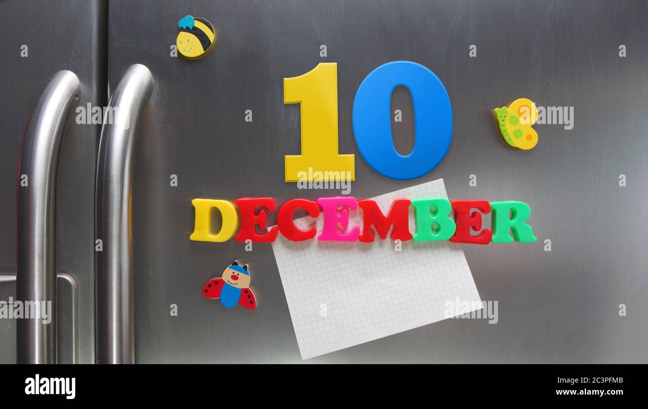 December 10 calendar date made with plastic magnetic letters holding a ...