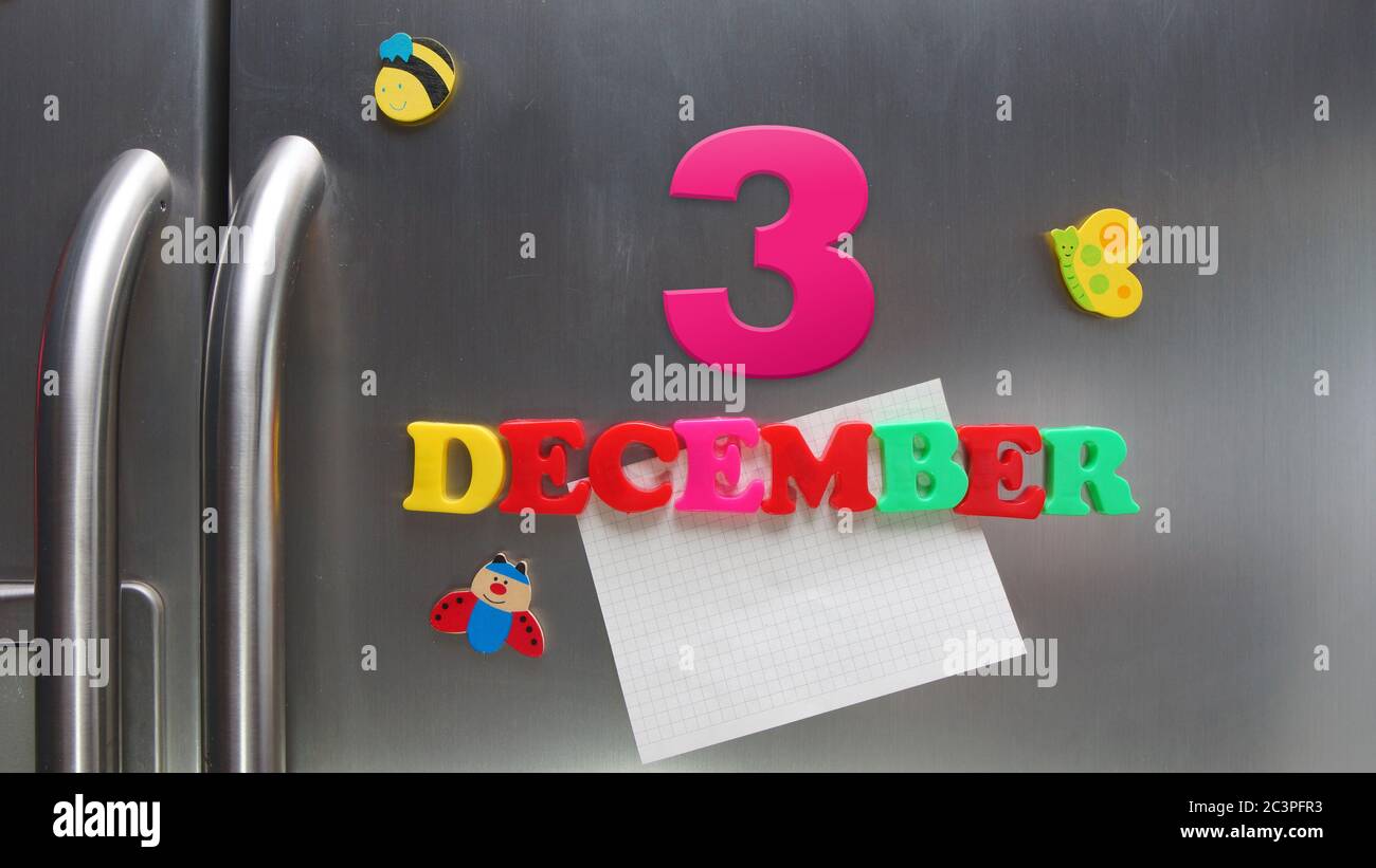 December 3 calendar date made with plastic magnetic letters holding a ...