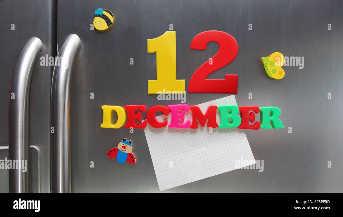 December 12 calendar date made with plastic magnetic letters holding a ...