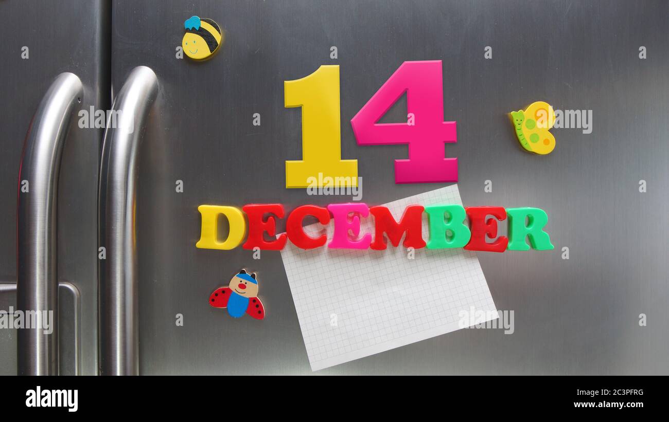 December 14 calendar date made with plastic magnetic letters holding a ...