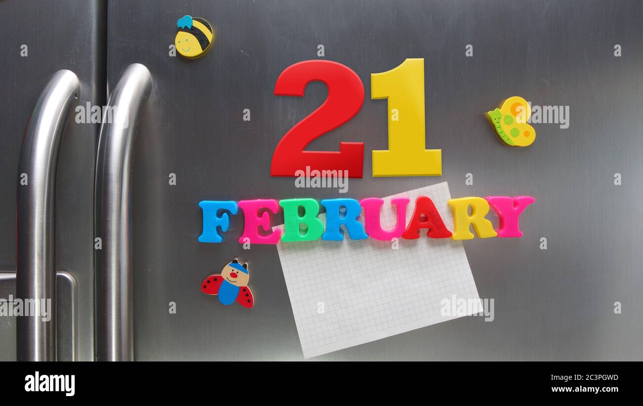 February 21 calendar date made with plastic magnetic letters holding a ...