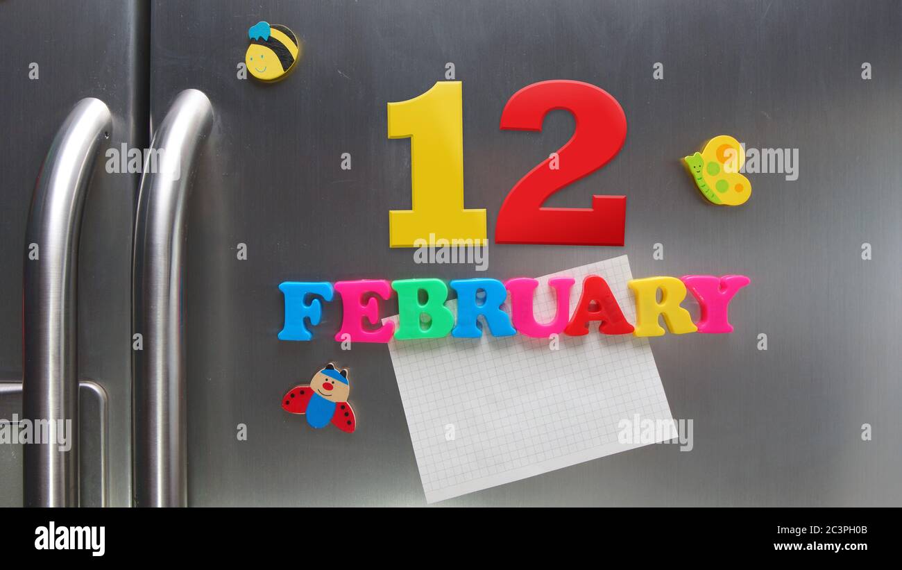 February 12 calendar date made with plastic magnetic letters holding a ...