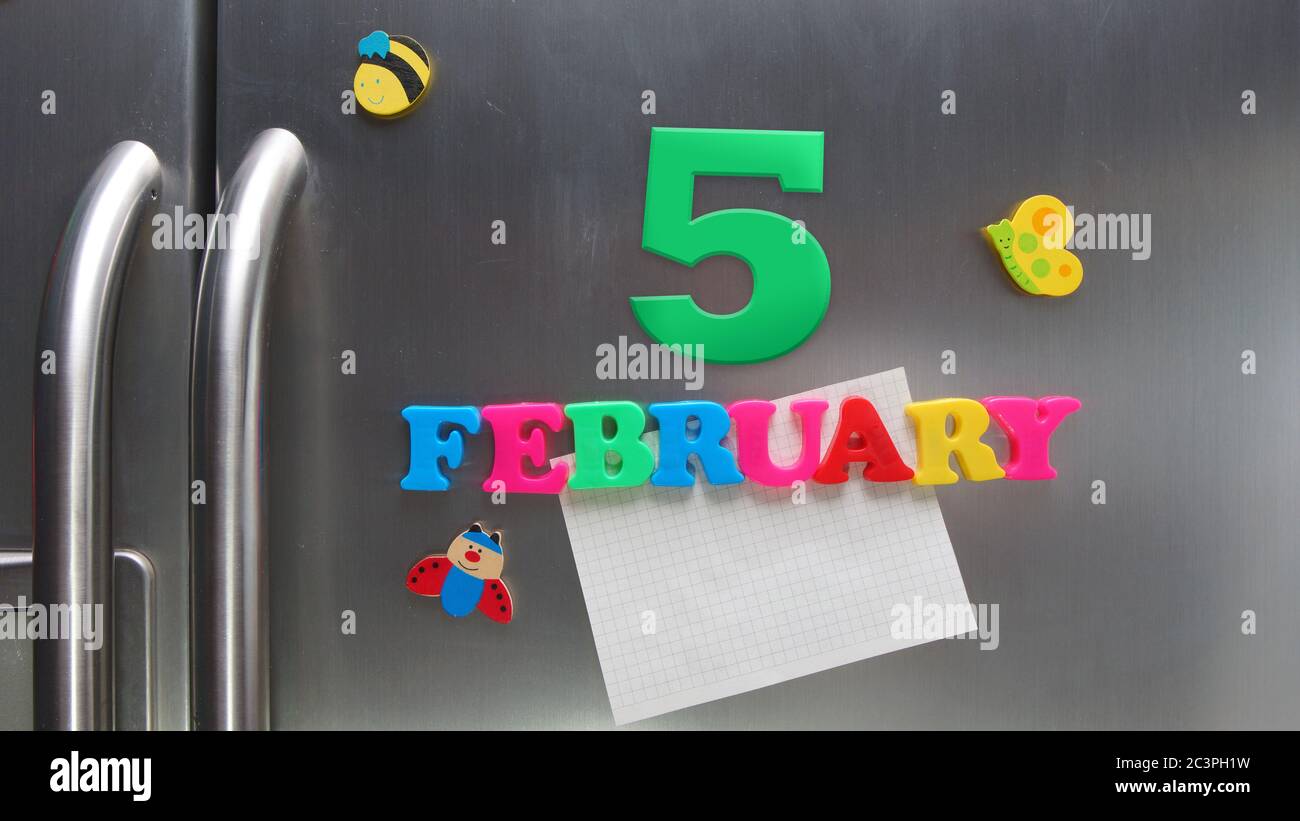 February 5 calendar date made with plastic magnetic letters holding a ...