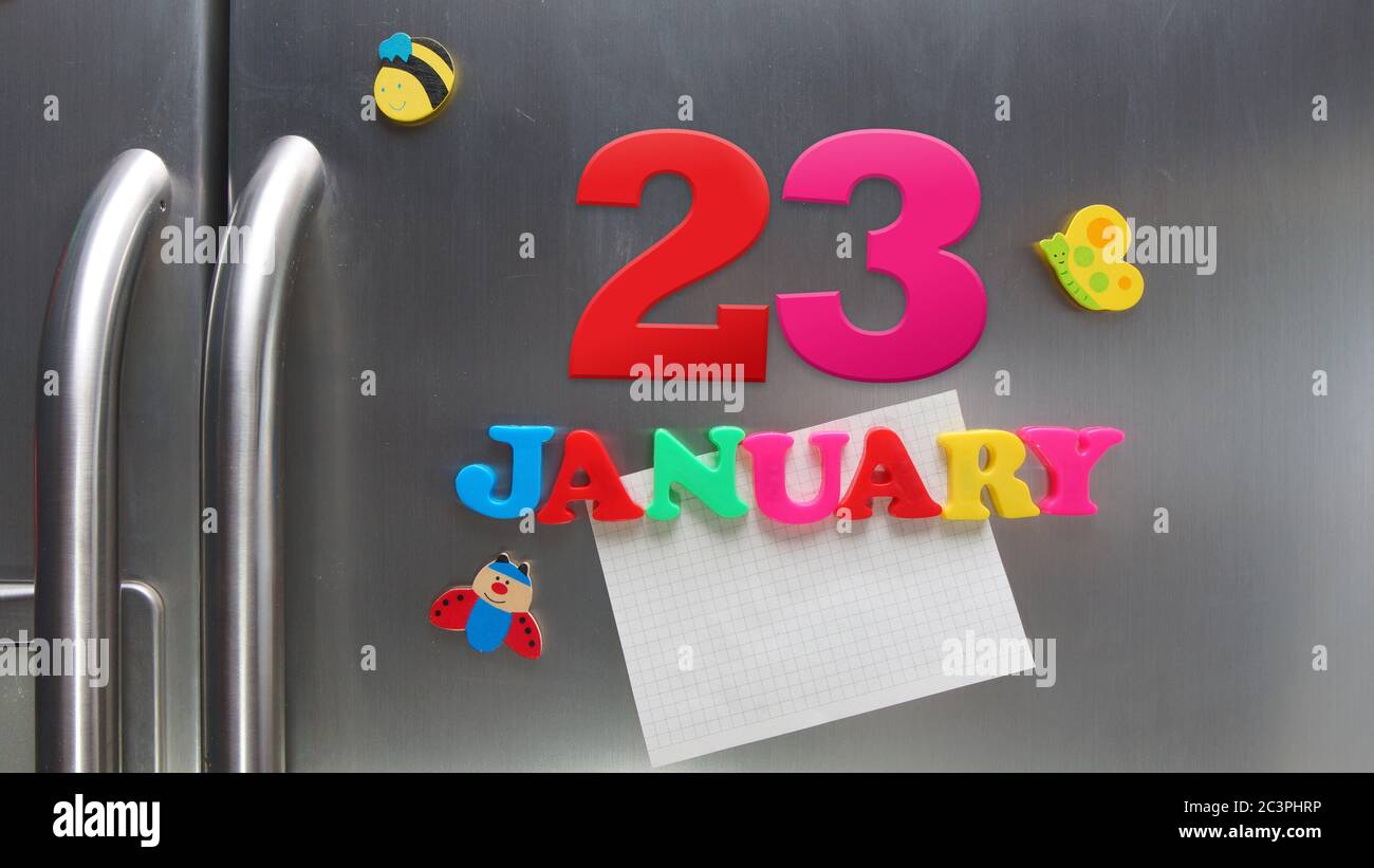 January 23 calendar date made with plastic magnetic letters holding a ...