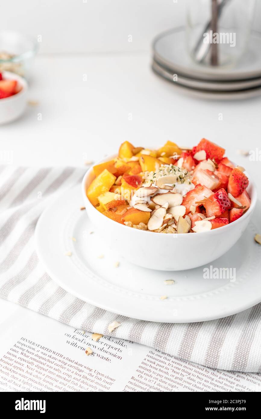 Healthy breakfast with fresh fruits and nuts Stock Photo - Alamy