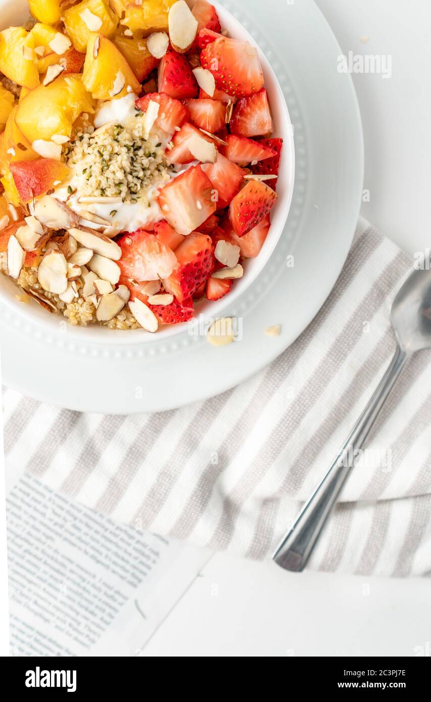 Healthy breakfast with fresh fruits and nuts Stock Photo - Alamy