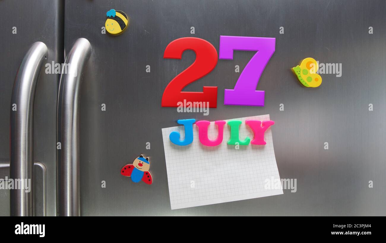 July 27 calendar date made with plastic magnetic letters holding a note ...