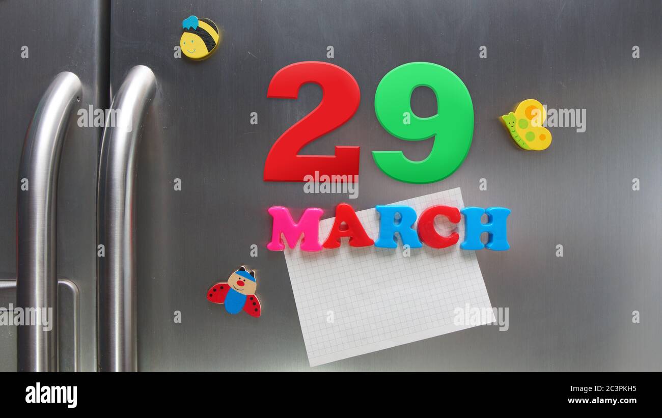 March 29 calendar date made with plastic magnetic letters holding a ...