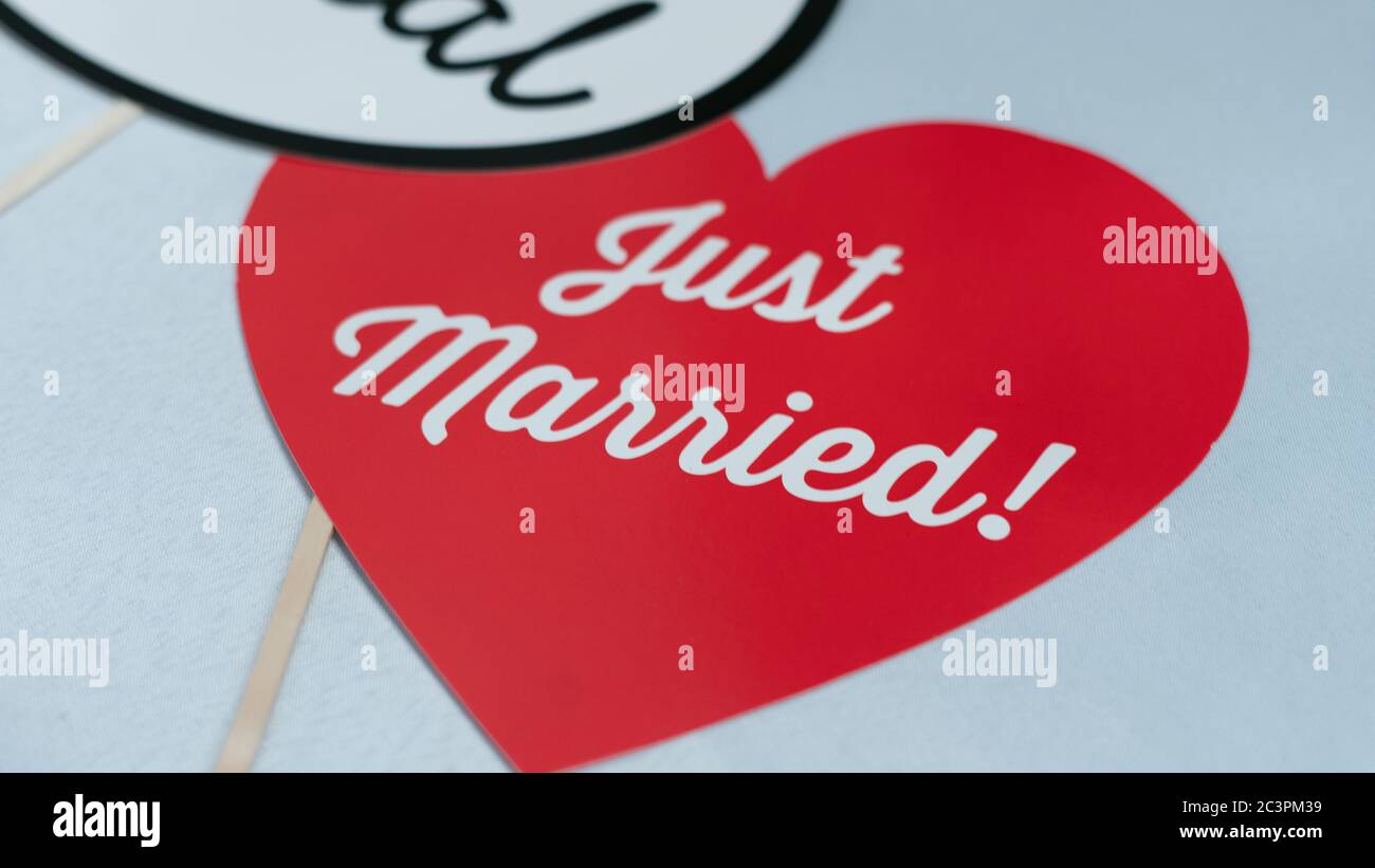 Closeup shot of Just Married red heart isolated on white background ...