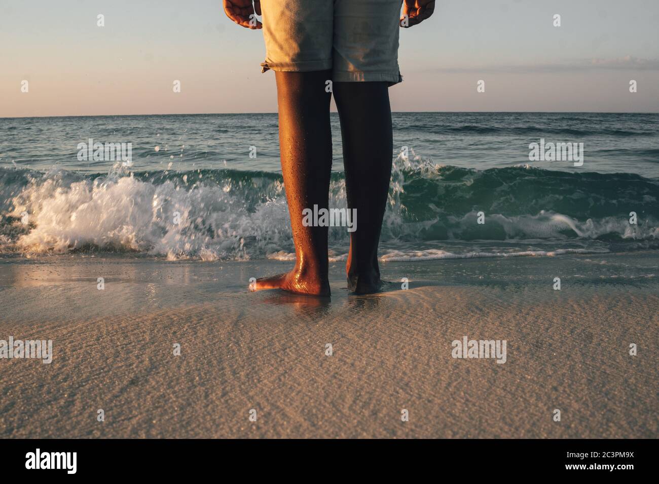 Closeup shot of a male feet at the beach Stock Photo - Alamy