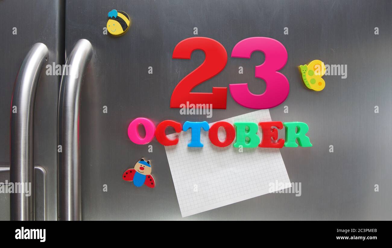 October 23 calendar date made with plastic magnetic letters holding a ...