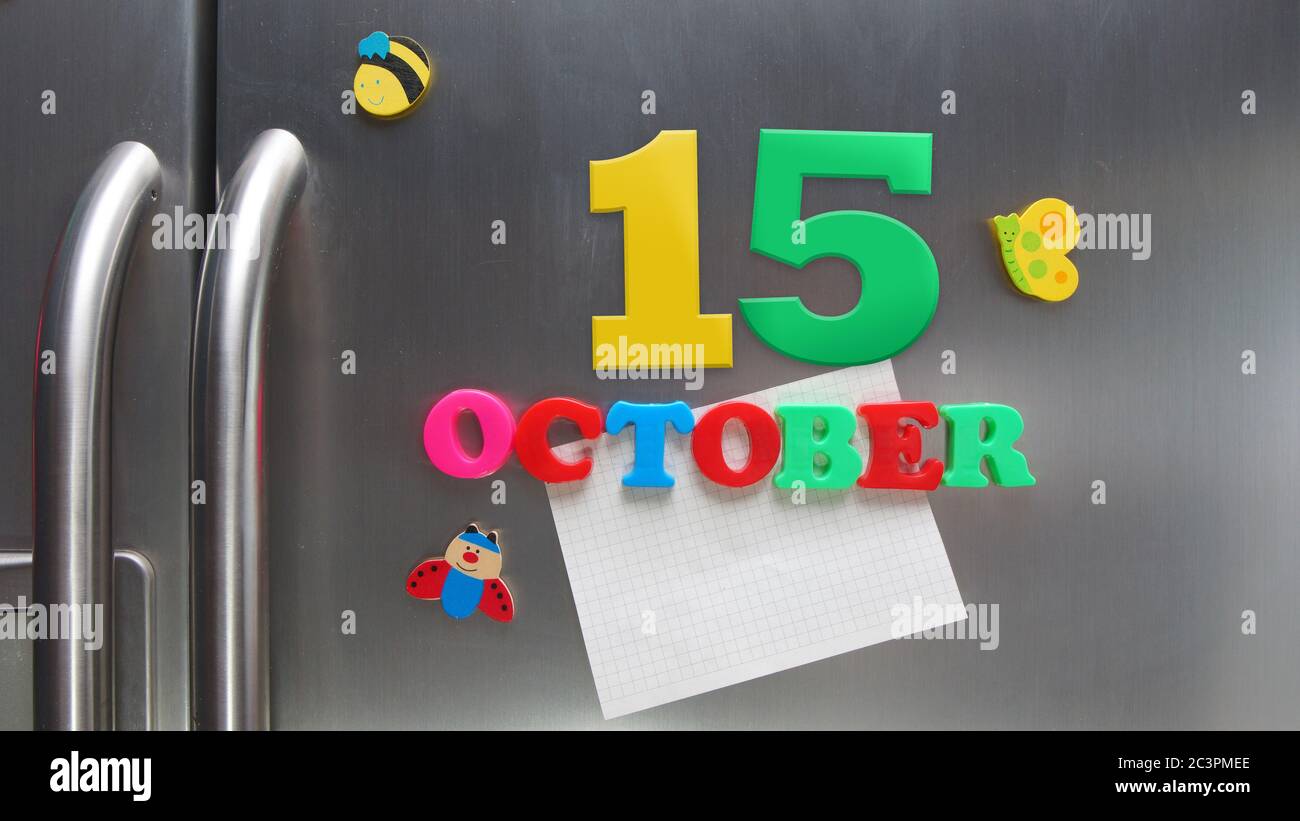 October 15 calendar date made with plastic magnetic letters holding a ...