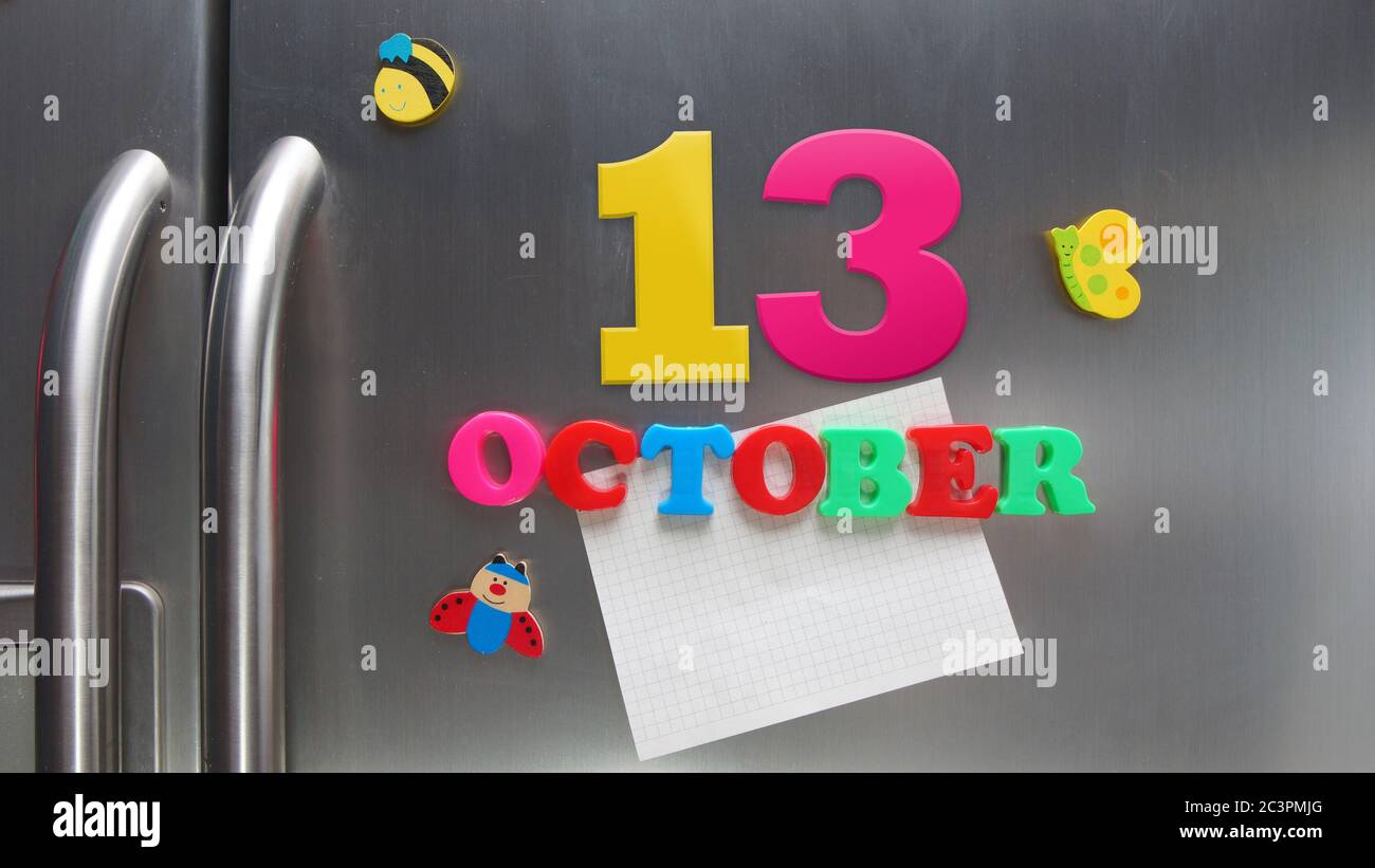 October 13 calendar date made with plastic magnetic letters holding a ...