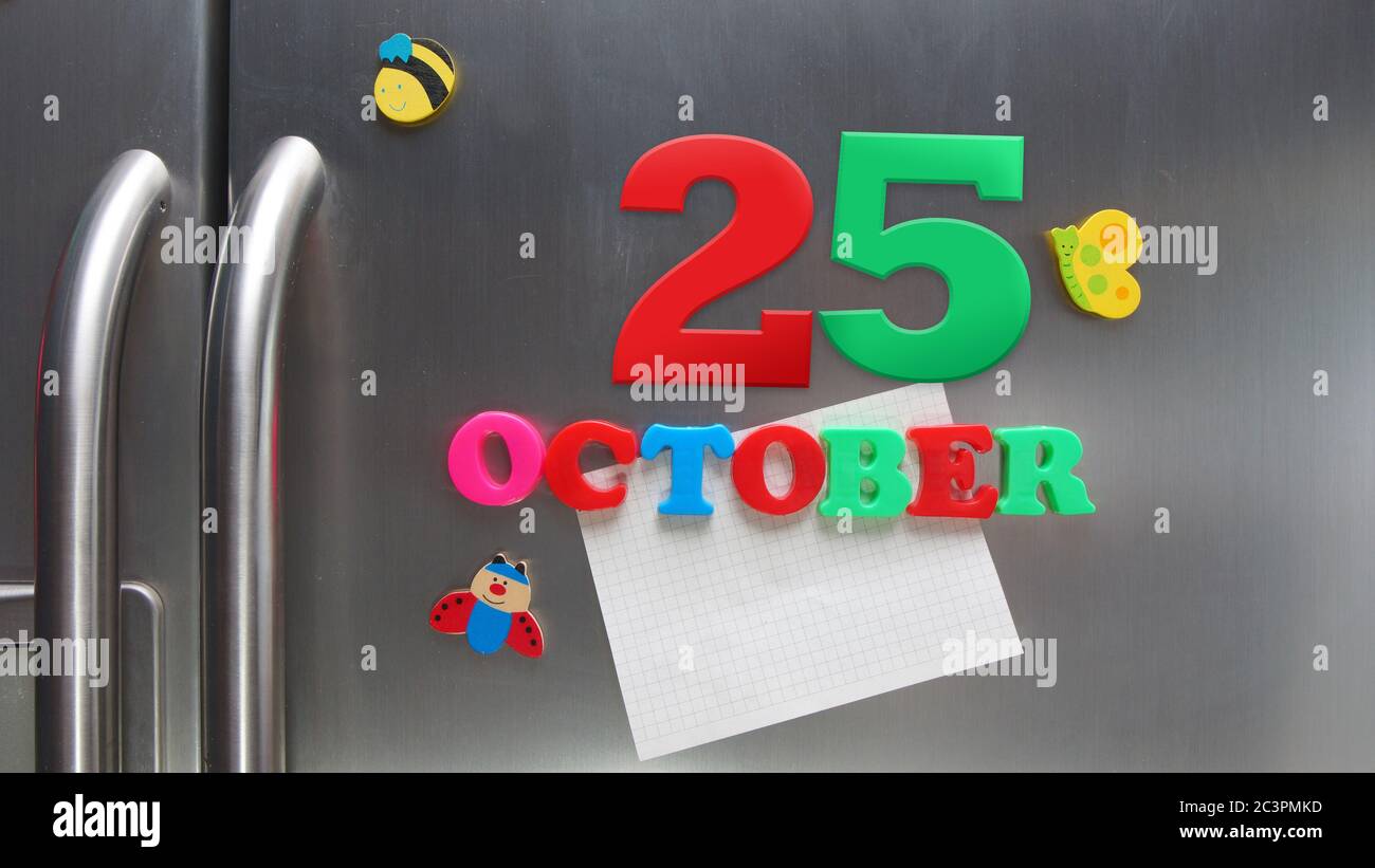 October 25 calendar date made with plastic magnetic letters holding a ...
