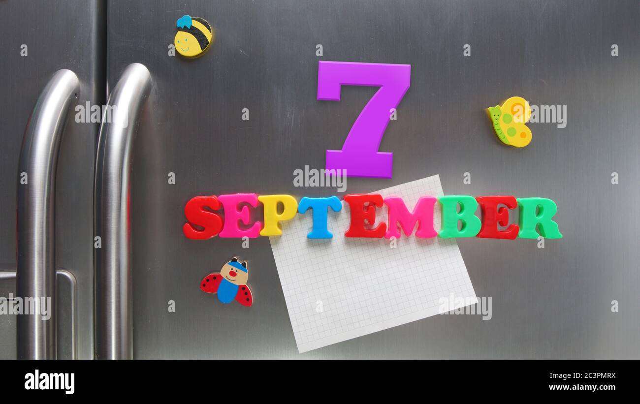 September 7 calendar date made with plastic magnetic letters holding a ...