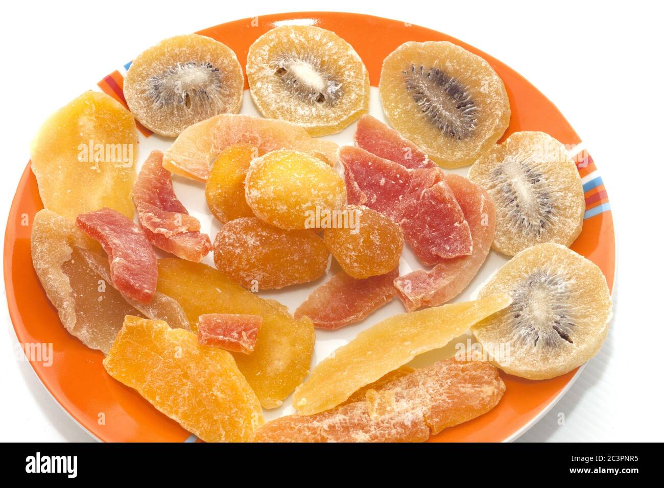 Closeup shot of different types of dried exotic fruit isolated on a ...
