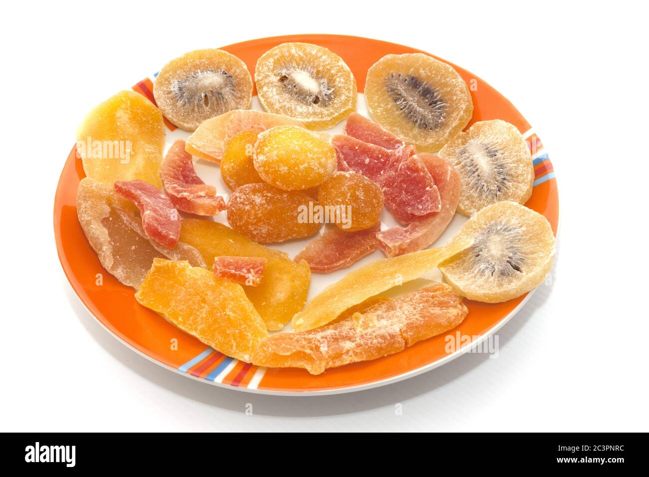 Closeup shot of different types of dried exotic fruit isolated on a ...