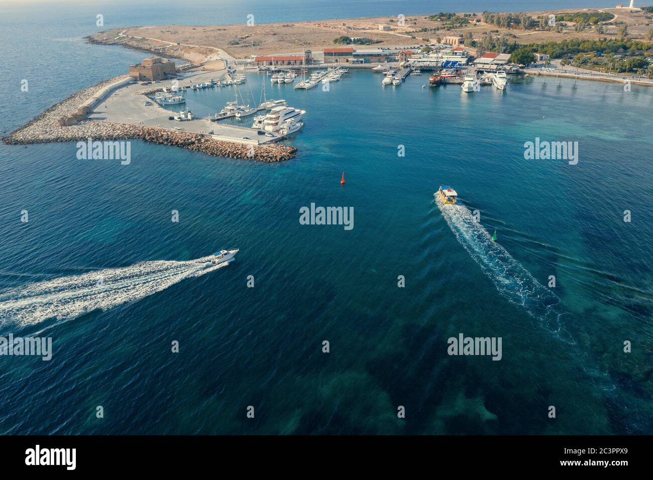 Aerial view of Paphos in Cyprus. Bay with boats and historic fortress ...