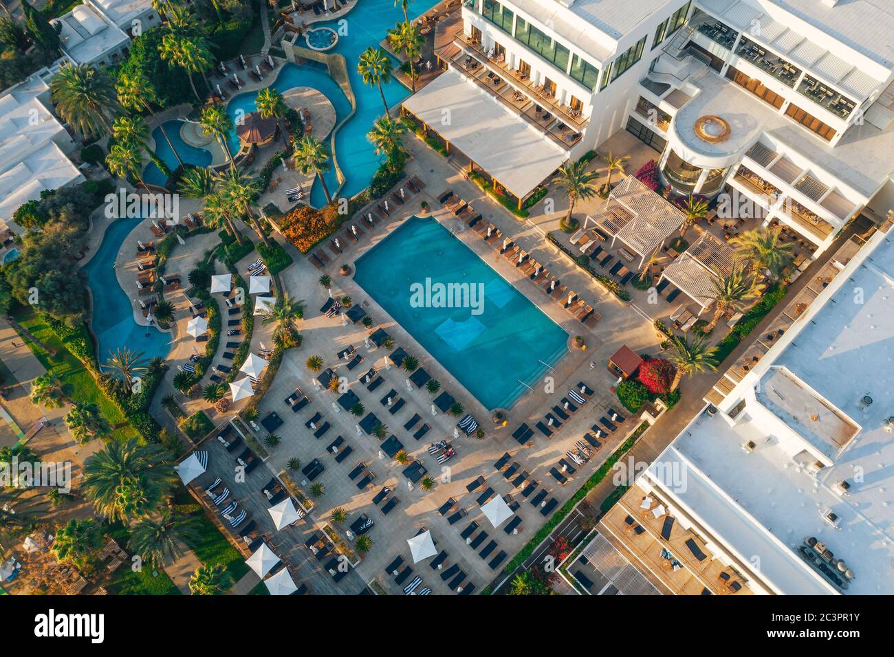 Aerial view of Hotel with pool on sea coast, drone photo from above of ...