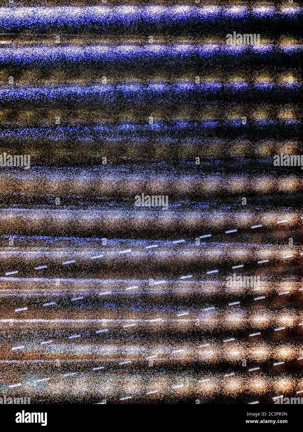 Vertical shot of a rough surface in blue and brown shades and some ...