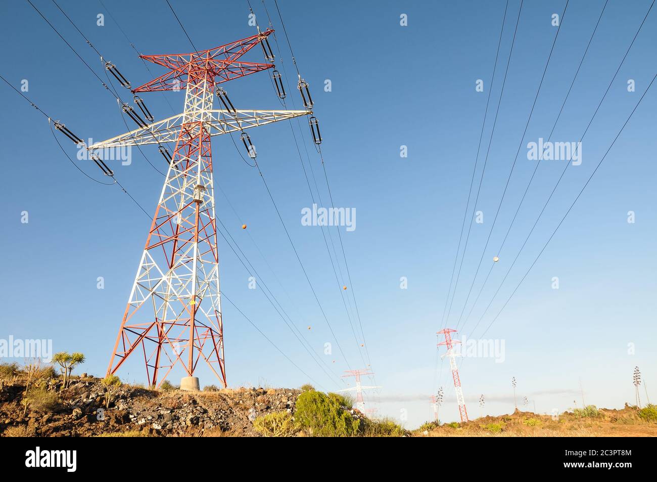 Energy Electricity Power Pylon on a Blue Sky Stock Photo - Alamy