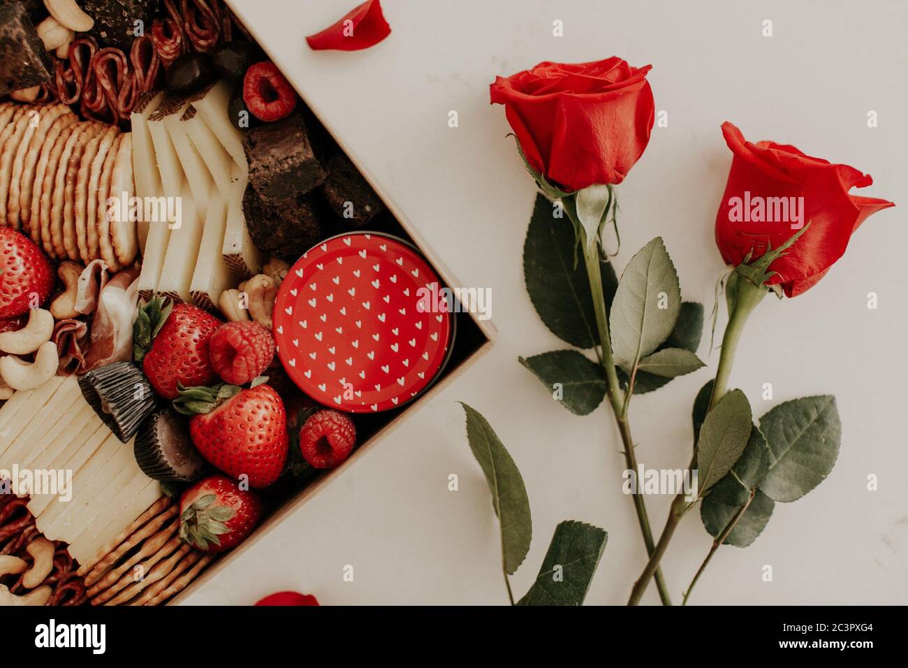 Sweets and roses as Valentine's day gift Stock Photo - Alamy