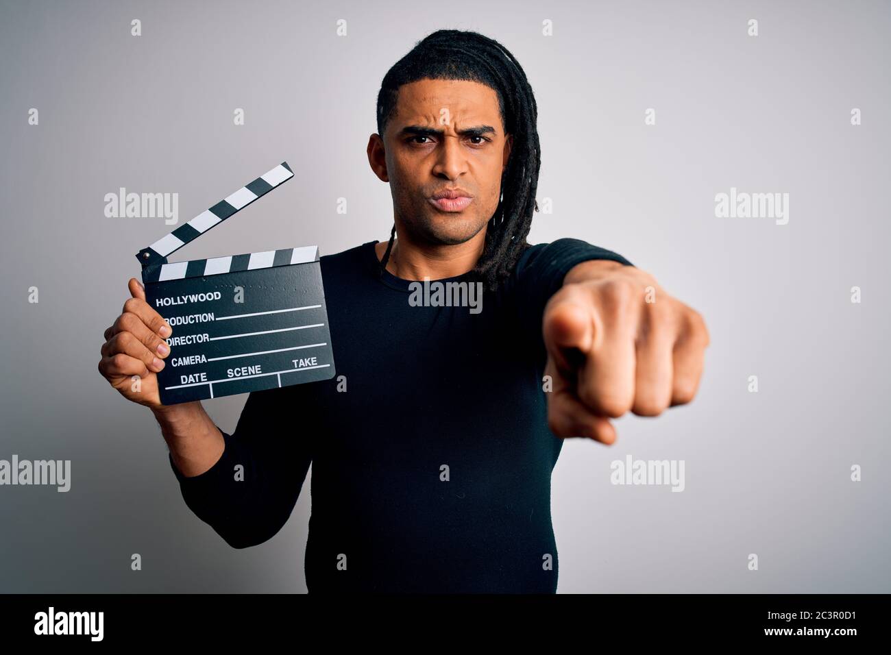Young african american afro director man making movie using clapboard ...