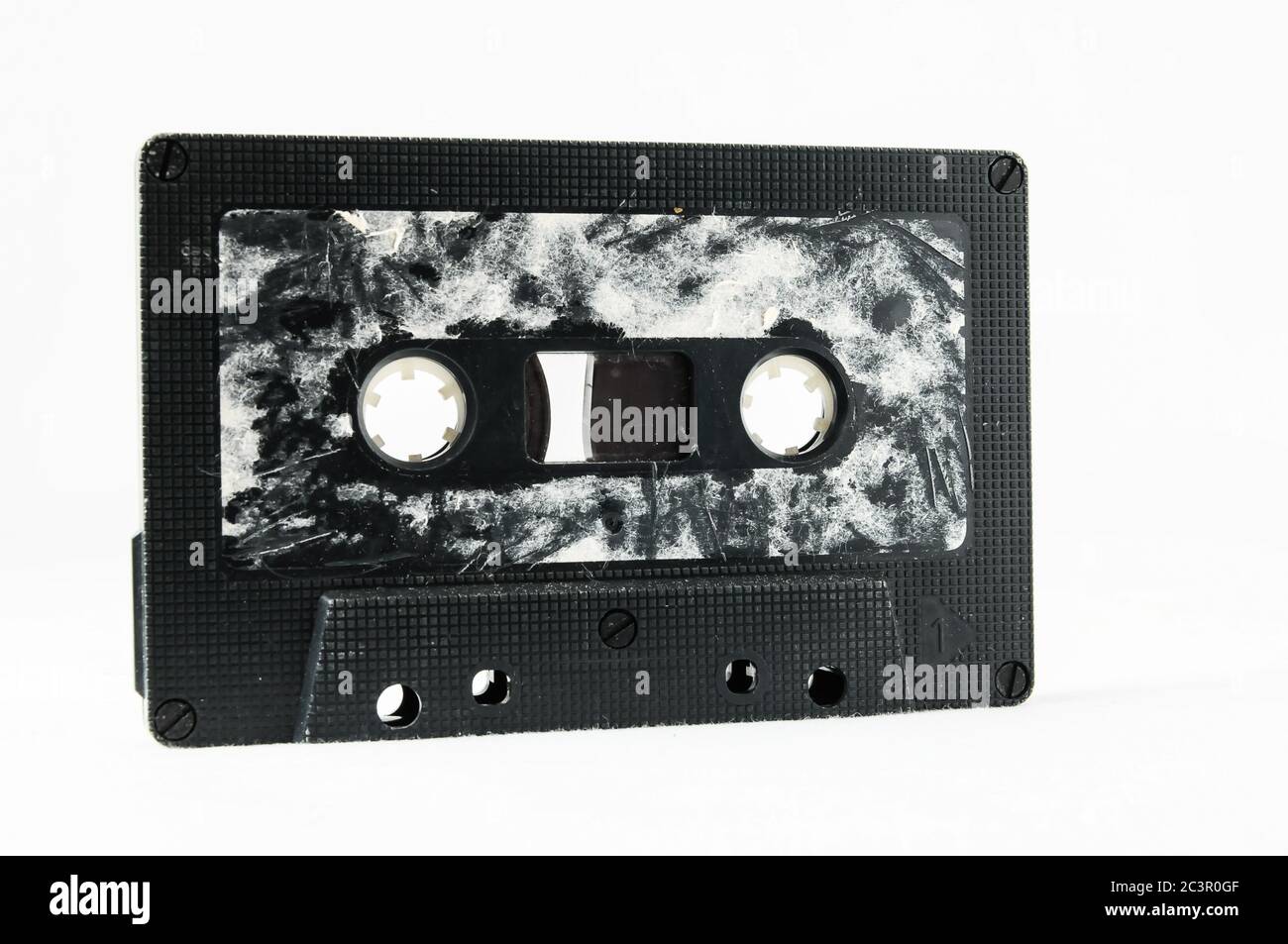 Ancient Vintage Used Musicassette over a White Background Stock Photo ...