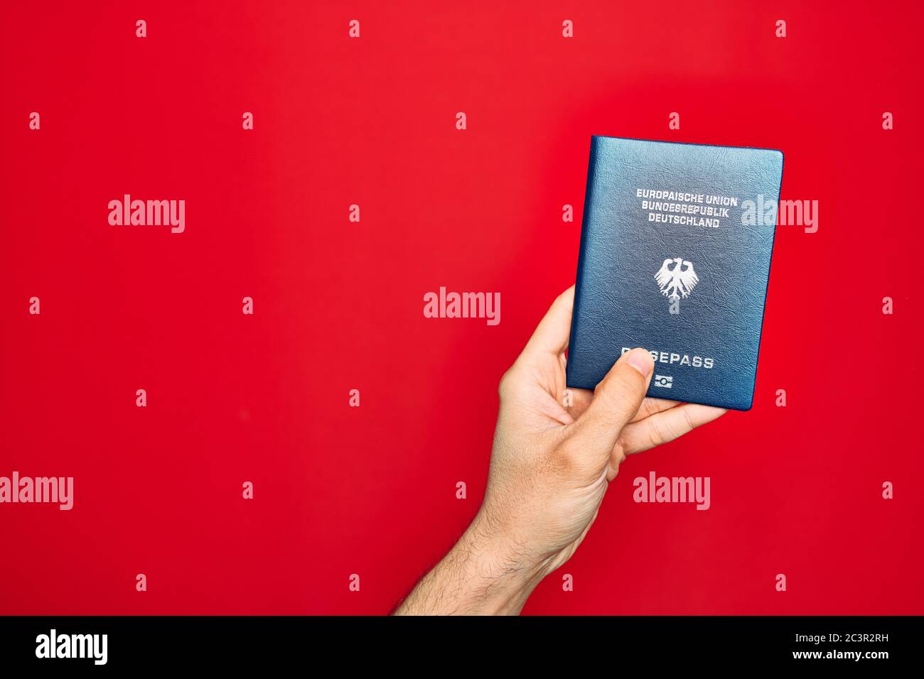 Beautiful hand of man holding german germany passport identification ...
