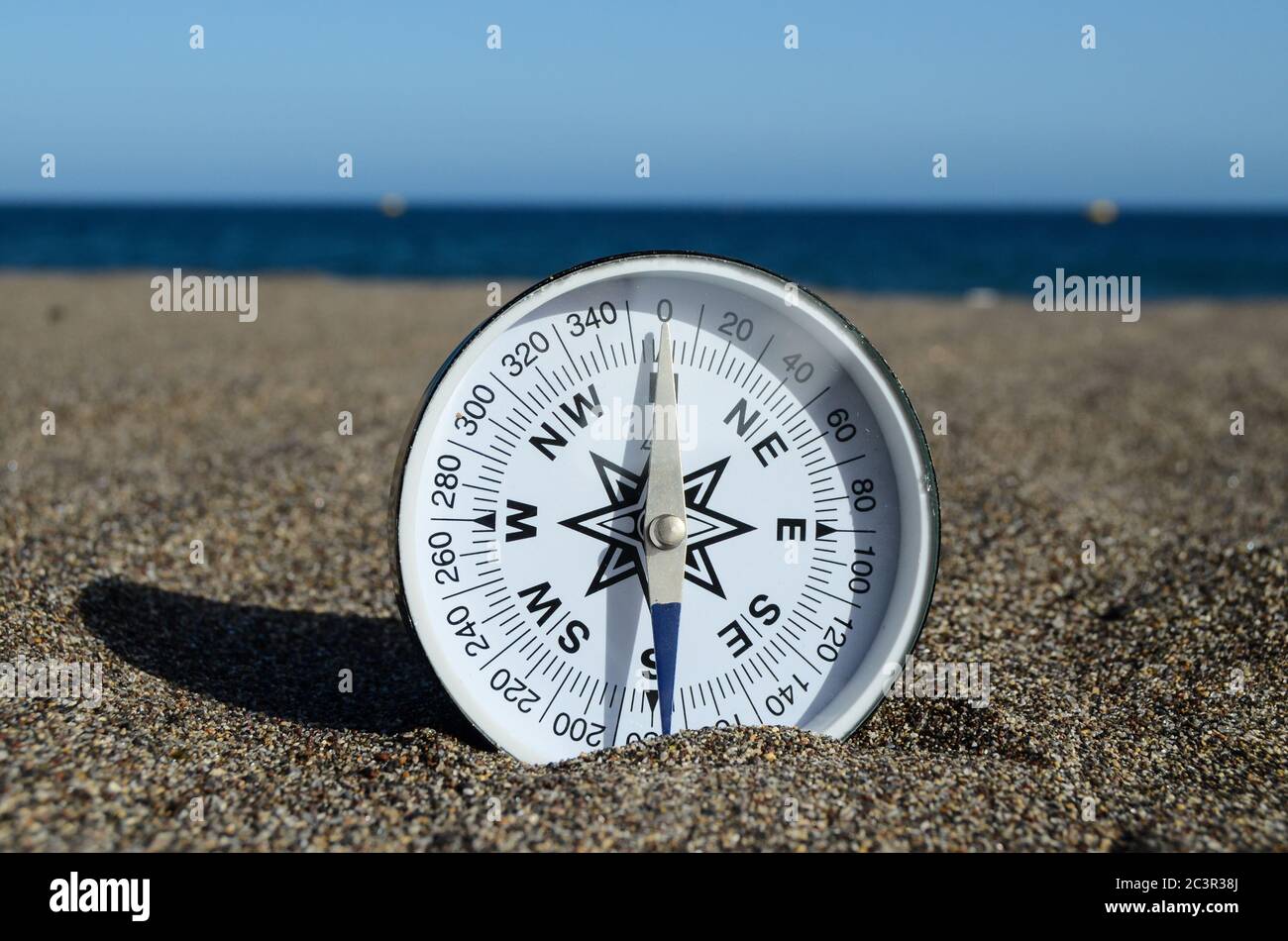 Orientation Concept One Compass on the Beach near the Atlantic Ocean ...
