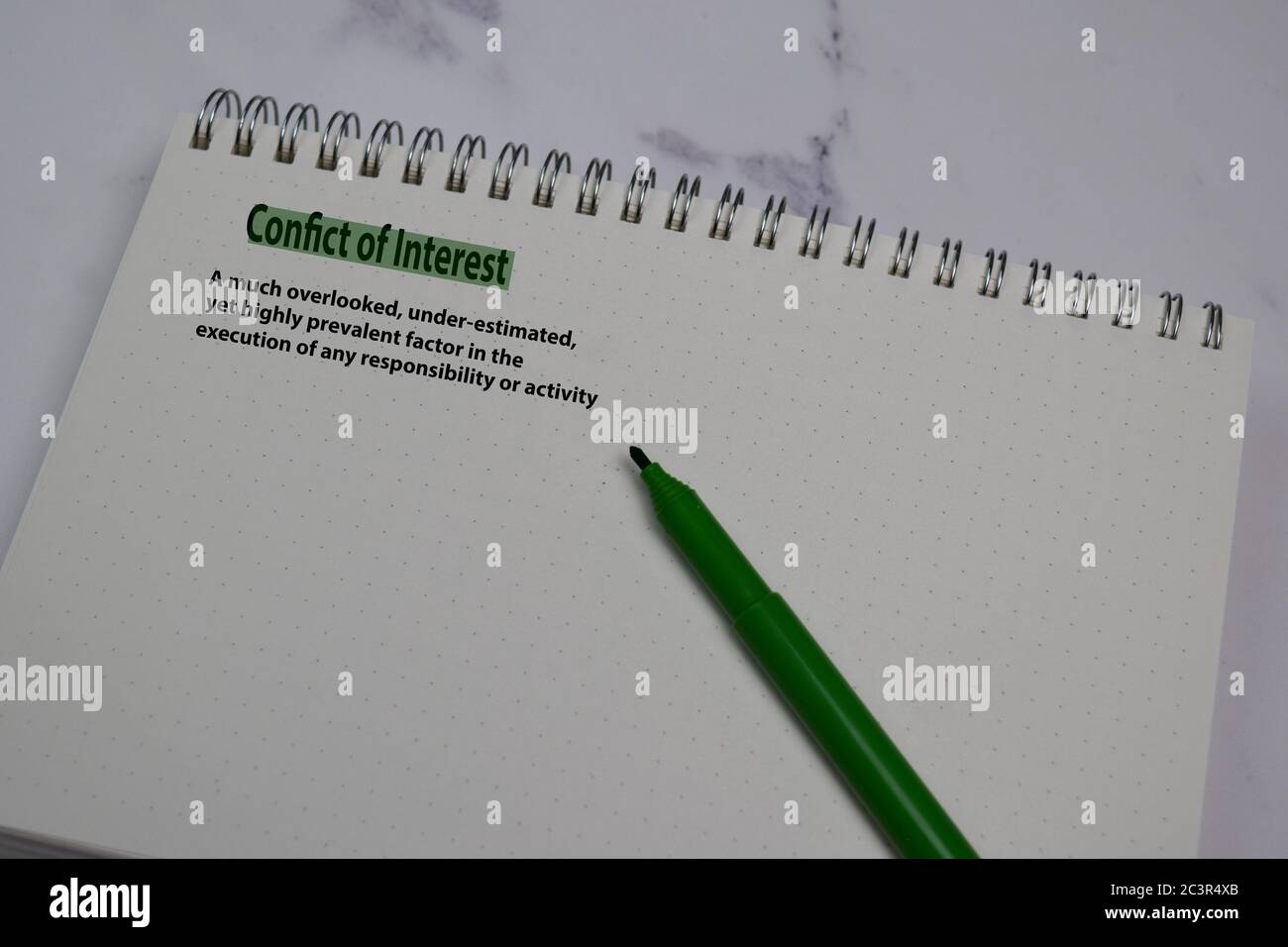 Definition of Conflict of Interest word with a meaning on a book ...